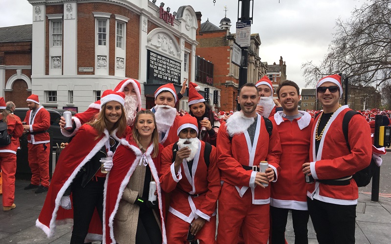 All for a good Claus: a sea of Santas take over south London for annual ...