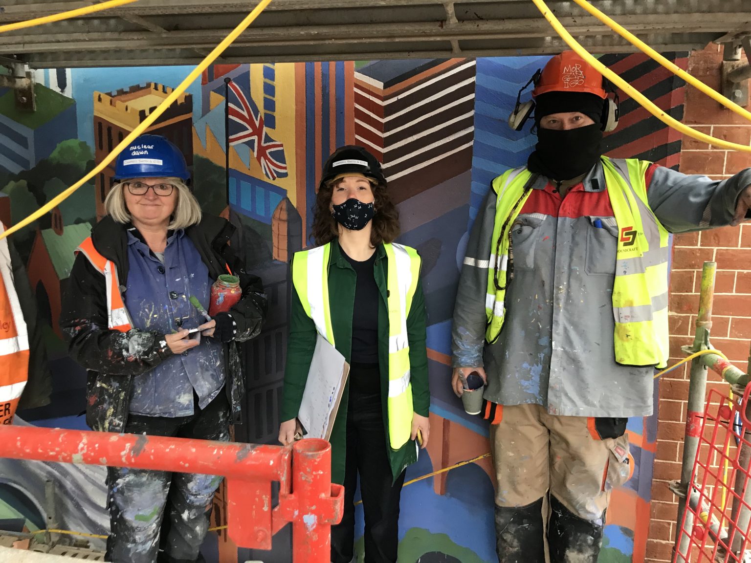 Iconic Brixton peace mural restored to former glory